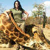 Defiant US hunter’s picture with dead giraffe stirs outrage